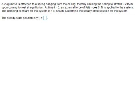Solved A 2 Kg Mass Is Attached To A Spring Hanging From The