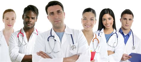 Dedicated Team Of Physicians During A Photoshoot Wallpaper Wallpapersok