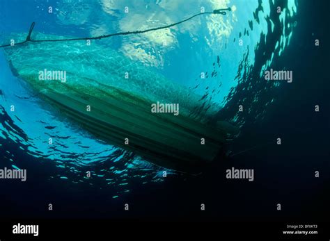 Underwater View Of Bottom Of Boat Looking Up Through Snells Window