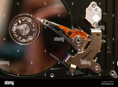 Computer Hard Disk Drives HDD SSD On Circuit Board Motherboard Background Close Up Stock