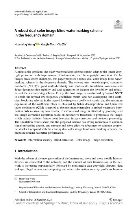 a robust dual color image blind watermarking scheme in the frequency domain