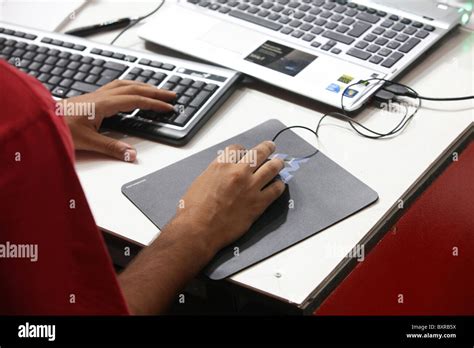 Man Using Keyboard Mouse And Laptop Stock Photo Alamy