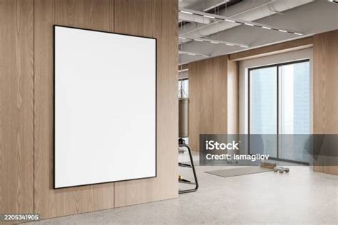 나무 벽 패널과 콘크리트 바닥이 있는 현대적인 체육관 인테리어의 대형 프레임 빈 포스터 모형 3d 렌더링 0명에 대한 스톡 사진 및 기타 이미지 Istock