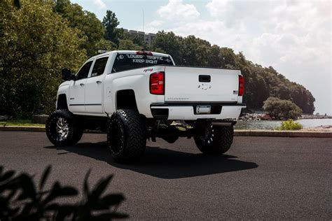 White Chevy Truck Lifted