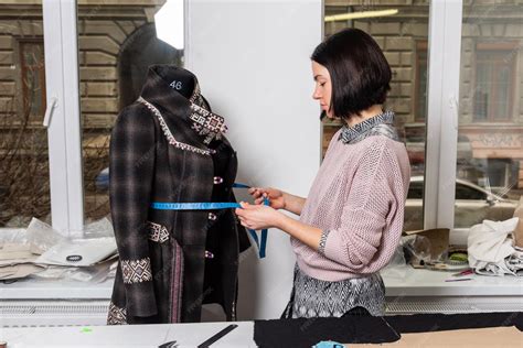 Seamstress Works In The Tailoring Workshop Premium Photo