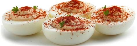 Five Deviled Eggs Garnished With Paprika And Parsley Sprig Perfectly