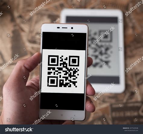Man Hand Scanning Qr Code Tablet Stock Photo 1077529538 Shutterstock