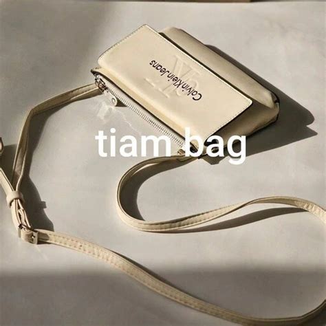 خرید و قیمت کیف پاسپورتی کلوین کلین با جنس چرم با کیفیت عالی بصورت تک و