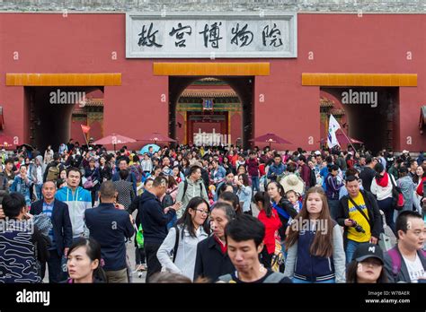 Tourists Crowd The Palace Museum Also Known As The Forbidden City