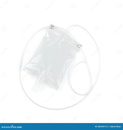 A Sterile Foley Catheter Kit With A Drainage Bag Lying On A White