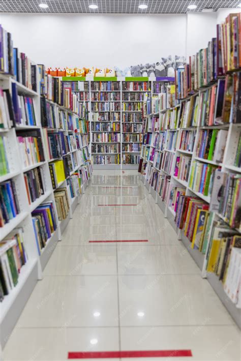 Books On Shelves In A Store A Large Assortment Of Literature Blurred