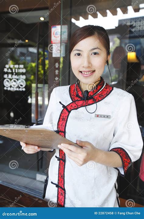 Waiter And Waitress In The Thai Restaurant Dancing Editorial Image