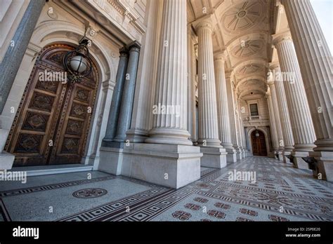 Mosaic Tiled Floor Fluted Stone Columns And Ornately Carved Wooden