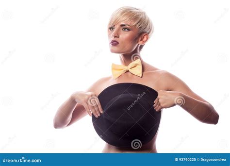 Sensual Gorgeous Woman Covering Her Breasts With A Hat Stock Image
