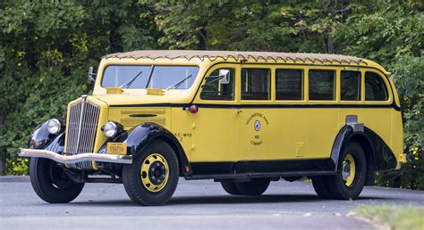 Big Yellow Different Yellowstone Used White 706 Bus Lets All The