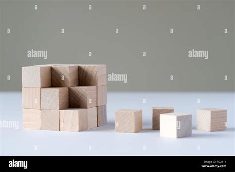 Wooden Cubes Form A Bigger Square Stock Photo Alamy