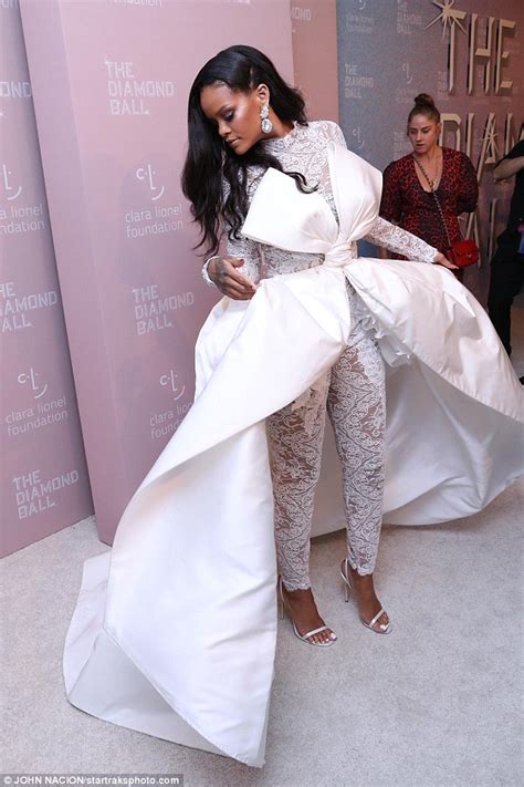 Rihanna Flashes Her Toned Midriff In Jumpsuit With Sultry Cut Outs