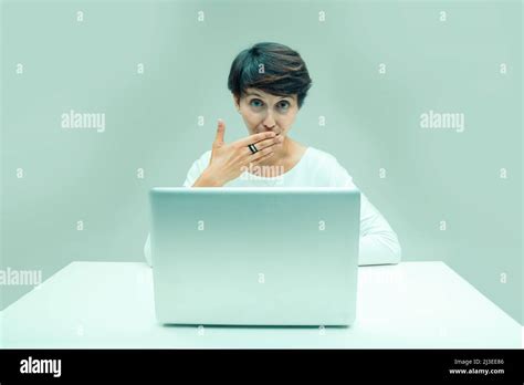 Funny Expression Of A Woman Who Pretends To Be Shocked By Probably Sexual Content She Sees On