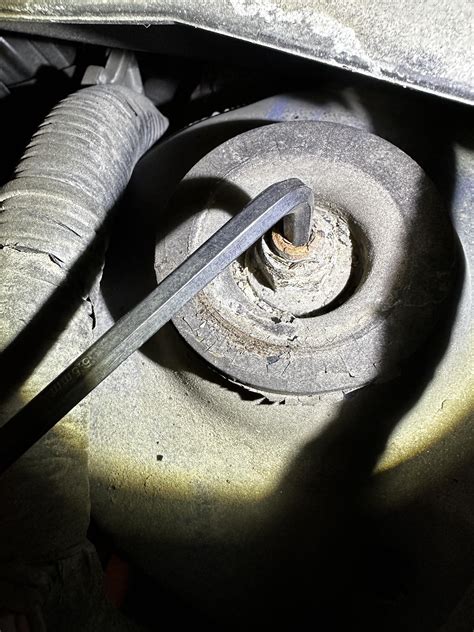Can’t get top nut on strut loose. : r/AskMechanics
