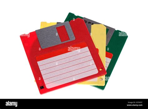 A Stack Of Vintage Computer Colored Floppy Disks Isolated On White Old Technologies Selective