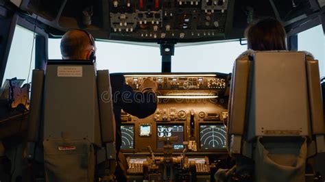 Woman Copilot Assisting Captain To Takeoff And Fly Airplane Stock Image Image Of Aircraft