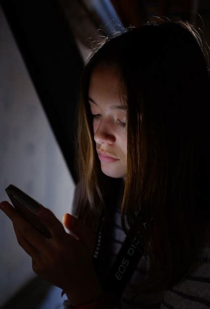 Premium Photo Close Up Of Girl Using Mobile Phone