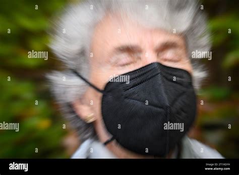 Woman Wears An N95 Face Mask Of The Type In Common Usage Due To Attempts To Control The Spread