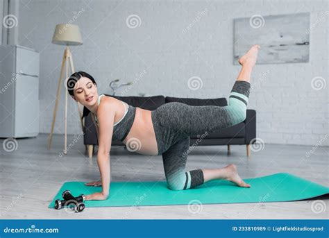 Barefoot Pregnant Woman Practicing Tiger Pose Stock Image Image Of