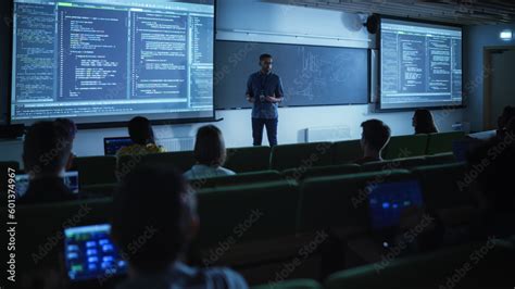 Young Male Teacher Giving A Data Science Lecture To Diverse Multiethnic