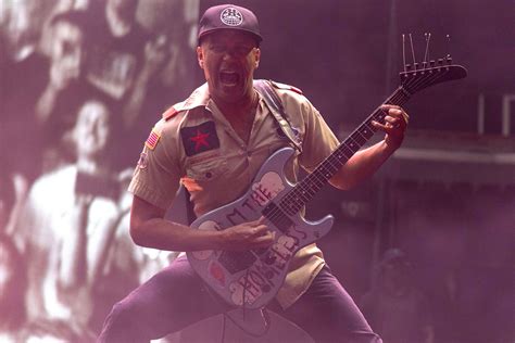Rage Against The Machine Guitarist Tackled By Security During Show