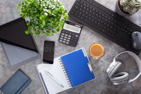Home Office Desk With Keyboard Computer Smartphone Notebook Houseplants
