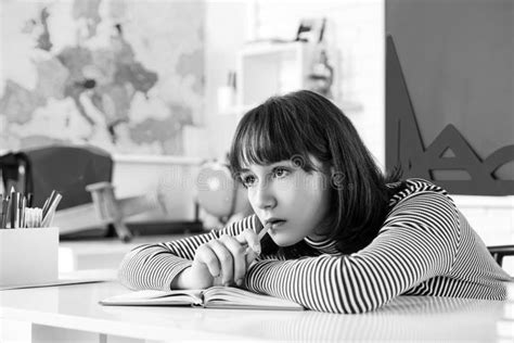 Teenage Girl Passing School Test In Classroom School Student Stock