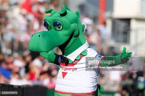 Dragon Mascot Photos And Premium High Res Pictures Getty Images