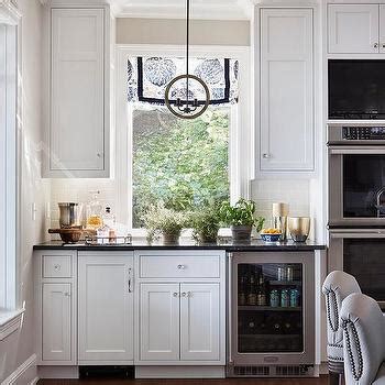 Kitchen Cabinets Around Window Style Function And Design Tips