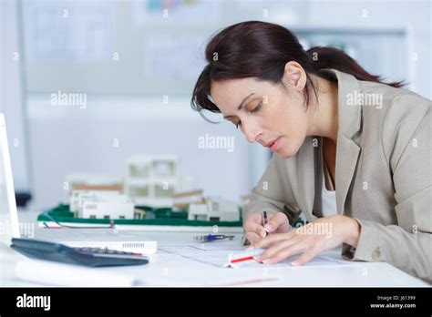Female Architect Using Scale Ruler Stock Photo Alamy