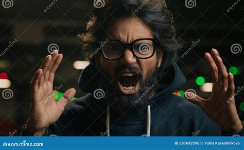 Close Up Angry Mad Aggressive Arabian Bearded Man In Glasses Scream At