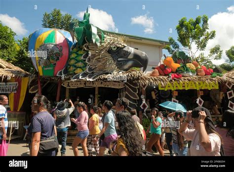 Malaybalay City Philippines People Walk On A Busy Street With