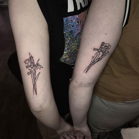 Matching Dagger And Flowers Tattoo For Couple