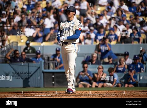 Los Angeles Dodgers Shohei Ohtani Walks Up To Bat During A Baseball