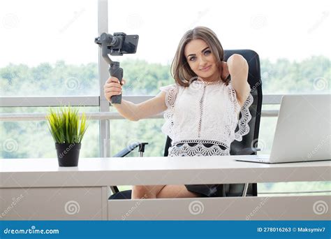 Woman Vlogger Recording Business Vlog At Office Desk Stock Image