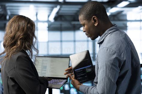 server room admins using devices to implement sustainable energy