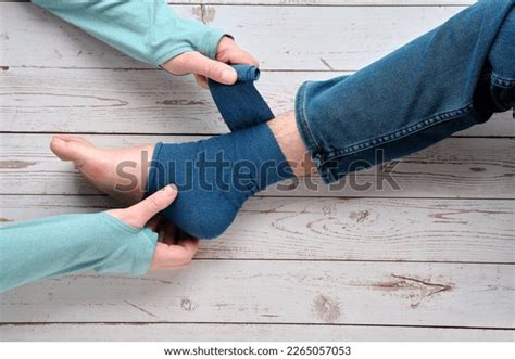 Adult Wrapping Compression Bandage Around Sprained Stock Photo 2265057053 Shutterstock