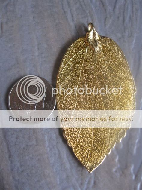 Brass Leaf Pendant Antiques Board