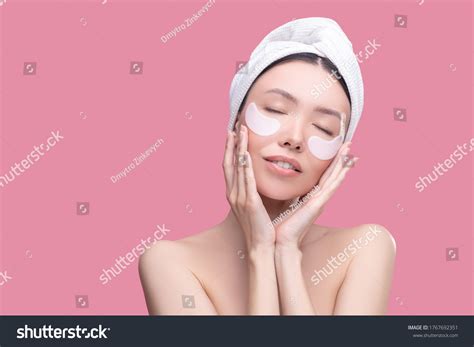 spa procedures woman having pleasure while doing cosmetological