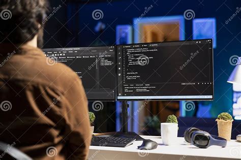 Tech Support It Worker Writing Testing And Debugging Code For Software