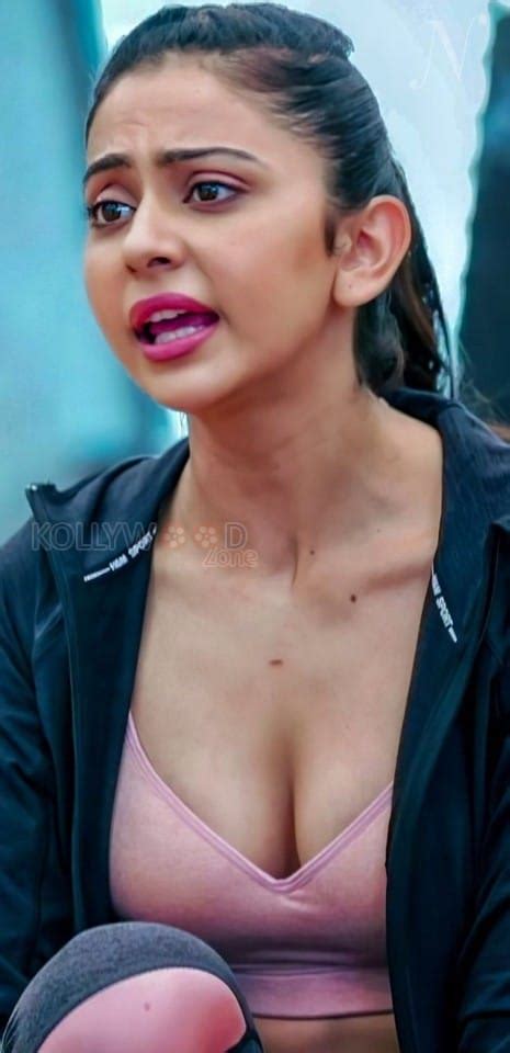 Glamorous Rakul Preet Singh Deep Cleavage In Sports Bra Photos 01