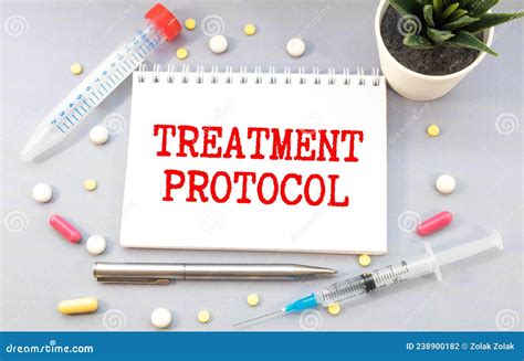 The Words Treatment Protocol Is Written On White Paper On A Grey
