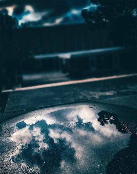 Rainy Reflection R Photographs