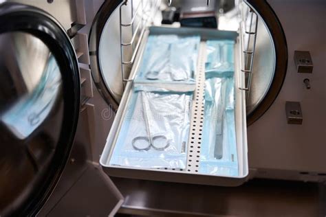 close up of sterilizing medical instruments in an autoclave in clinic