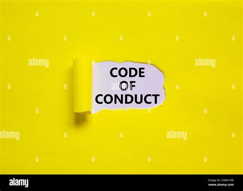 Code Of Conduct Symbol Words Code Of Conduct Appearing Behind Torn Yellow Paper Beautiful